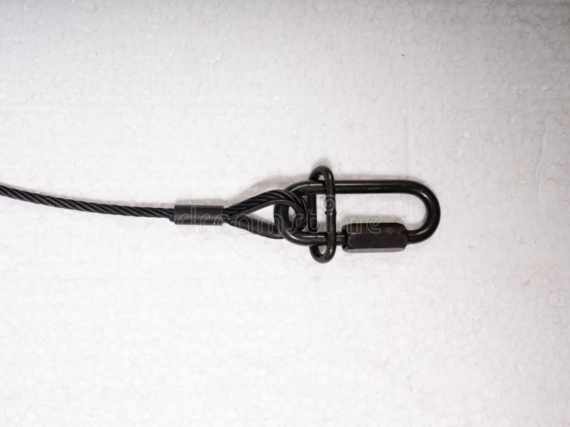 Black Metal Loop and Carabiner. Industrial Lock. White Background ...