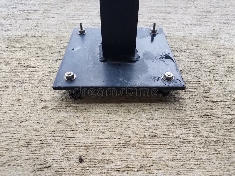 Black Metal Post with Screws on Grey Cement Stock Image - Image of post ...