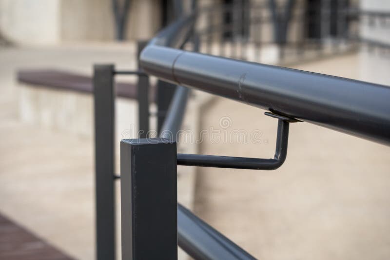 .black Metal Railing with Curved Tube and Rectangular Supports Stock ...