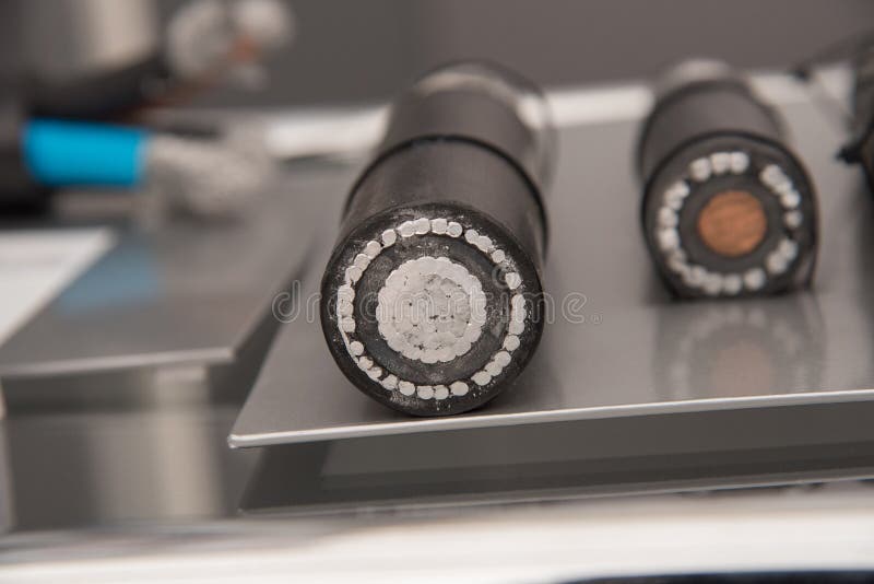 Black and Metallic Cable in a Section with Several Veins at the Stock ...