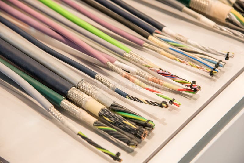 Black and Metallic Cable in a Section with Several Veins at the Stock ...