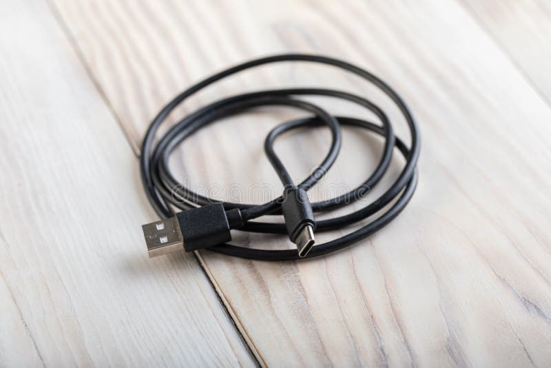 Black Micro Usb Connector, Mobile Charger Plug Cable on Wood Background ...
