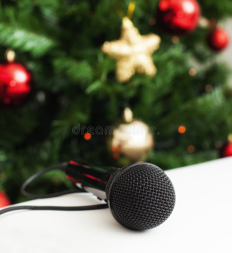 Black Microphone with Christmas Tree Stock Image - Image of performance ...