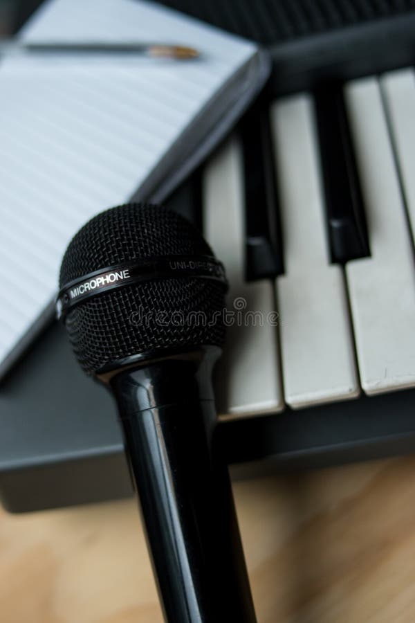 Microphone and Piano Key in Recording Studio Stock Photo - Image of ...