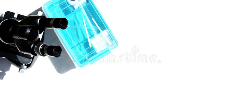 Black Microscope on a White Background, Horizontal View, Cropped Shot ...