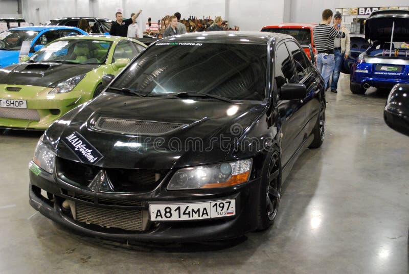 Black Mitsubishi Lancer Evolution VII in Crocus Expo 2012 Editorial ...