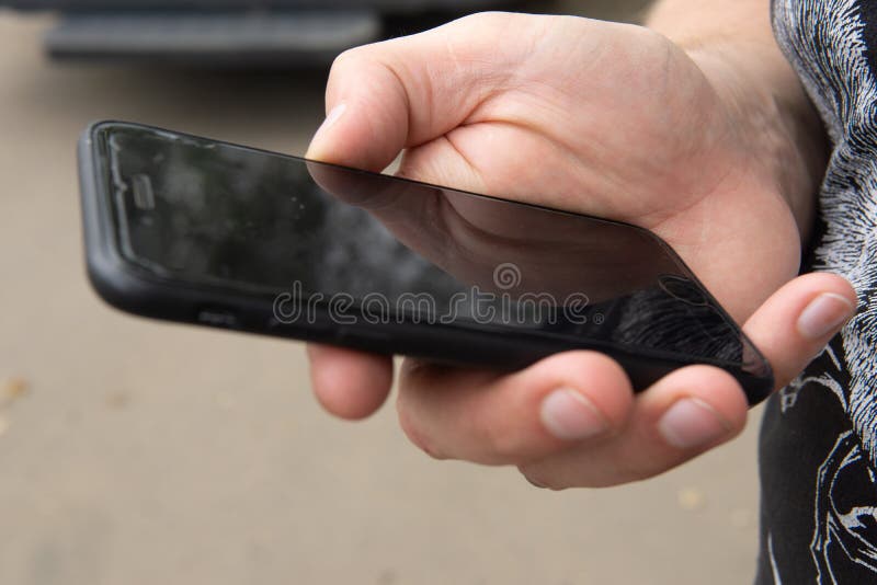 Black Mobile Phone in Male Hand Stock Image - Image of closeup, display ...