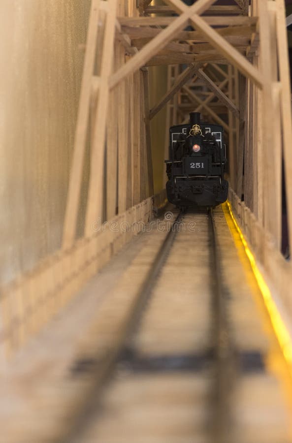 Black Model Locomotive on Track Layout with Headlamp Stock Photo ...