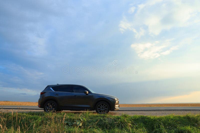Black Modern Car Parked on Roadside, Space for Text Stock Image - Image ...
