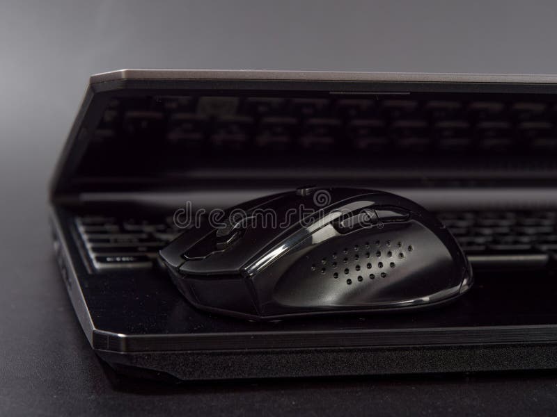 Black Modern Computer Mouse on Dark Background Stock Photo - Image of ...