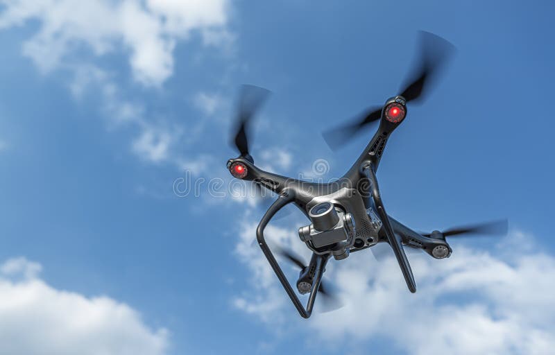 A Modern Drone with a Camera Flies in the Blue Sky. Generated by ...