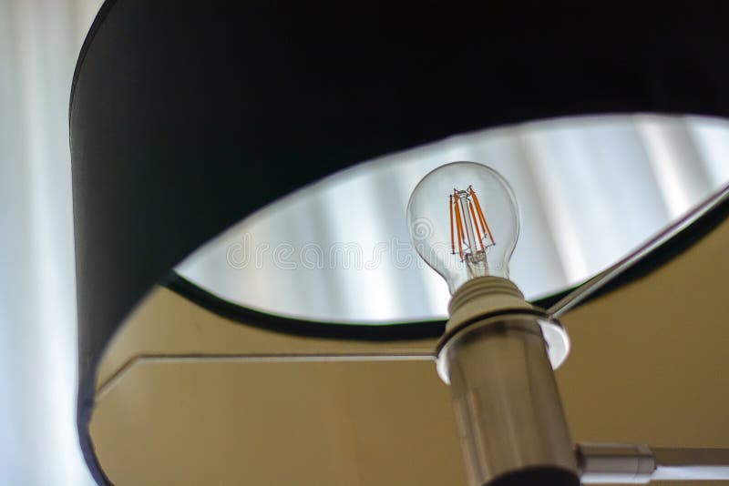 Black Modern Floor Lamp Bottom View of the Light Bulb. Stock Photo ...