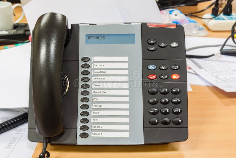 Black Modern Telephone in Office Stock Photo - Image of device, cable ...