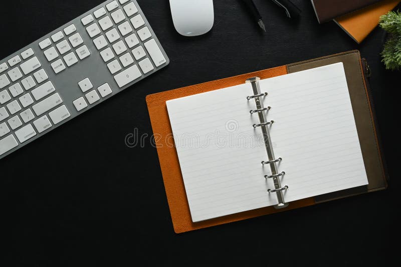 Black Modern Workspace with Blank Notepad, Keyboard, Mouse and Potted ...