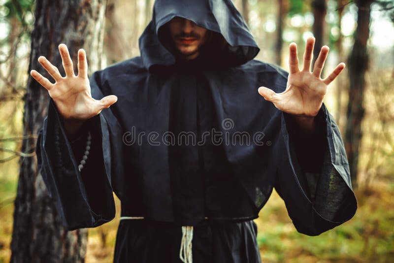 Warlock pointing finger stock image. Image of dark, monk - 112036579