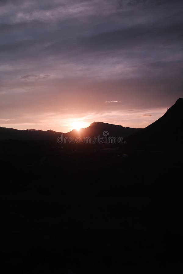 Black Mountains at Sunset with Pink Sky Vertical Photo Stock Image ...