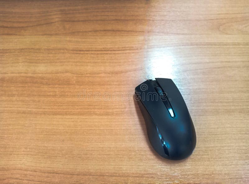 Black Mouse on Wooden Desk Texture with Free Copy Space Stock Photo ...