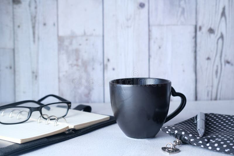 Black Mug Mockup, Modern Workspace with Notepad and Eyeglass on Table ...