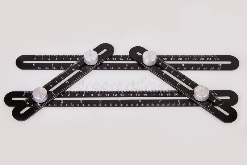 Black Multi Function Ruler Isolated on White Background. Stock Image ...