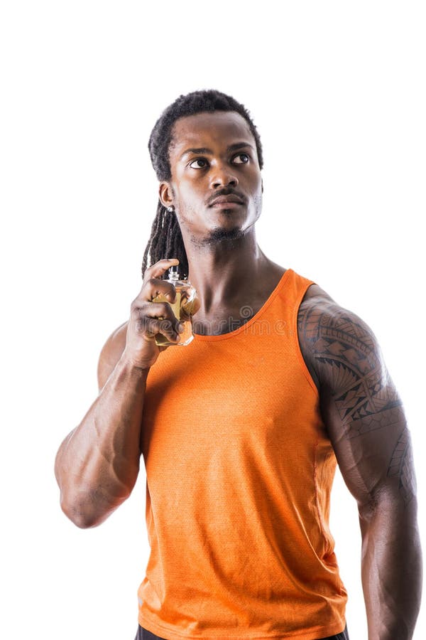 Black Muscular Male Model Spraying Cologne Stock Photo - Image of ...