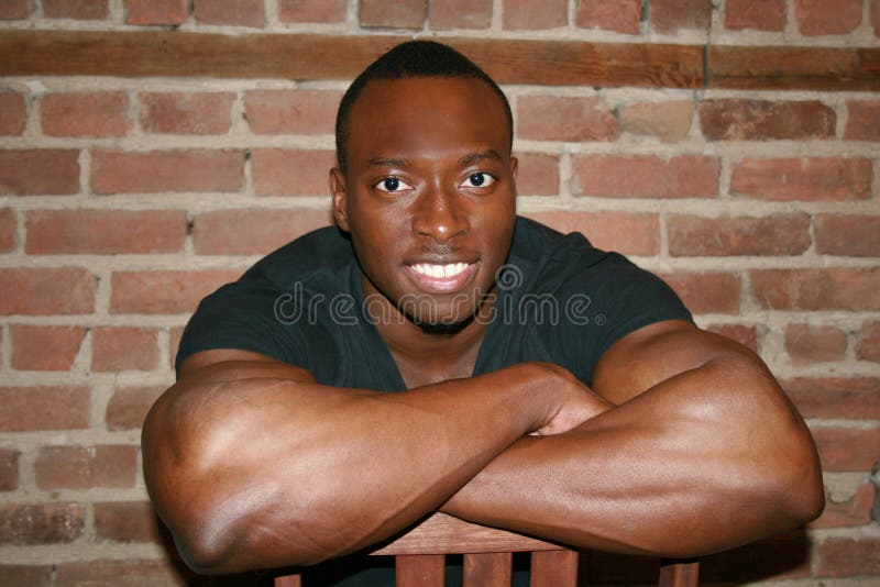 Black muscular man smiling stock photo. Image of muscular - 11668752
