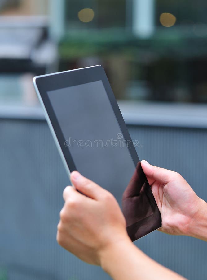 Holding Apple Ipad in Hands Stock Photo - Image of garden, mobile: 25038052