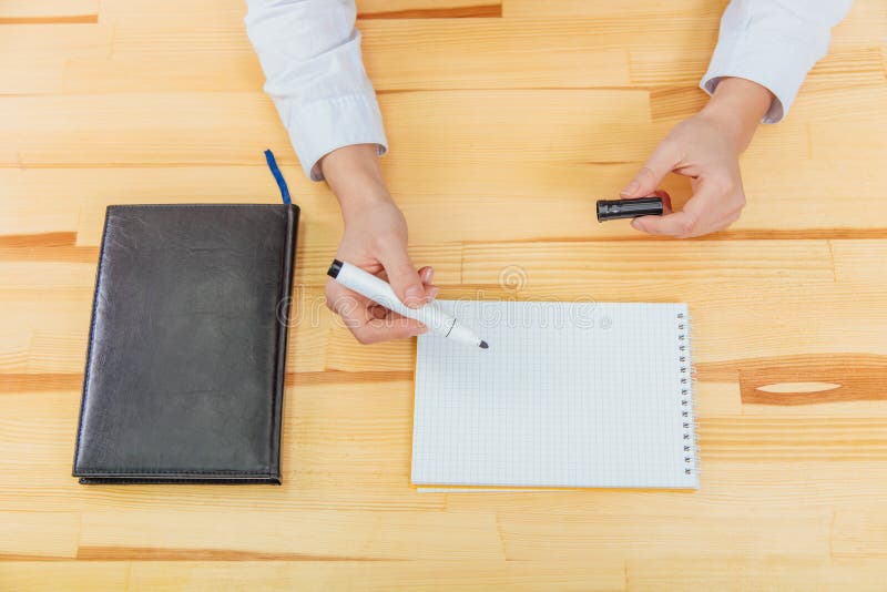 Black Notebook with a White Handle on the Table Top View. at the Office ...