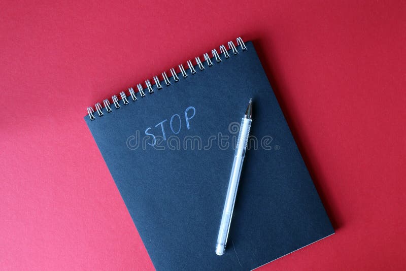 Black Notepad on a Red Background with the Text Stop the War. World ...