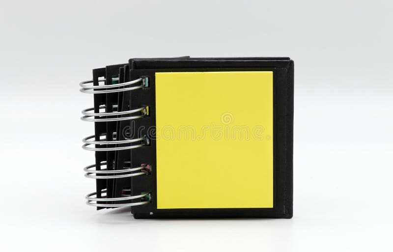 A Black Notepad with Yellow Pages Sits Open and Ready for Note-taking ...