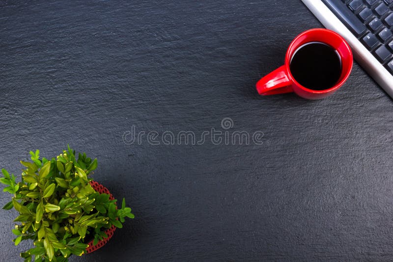 Black Office Desk Table with Computer, Pen and a Cup of Coffee, Lot of ...