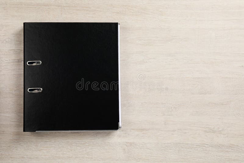 Black Office Folder on White Wooden Table, Top View. Space for Text ...