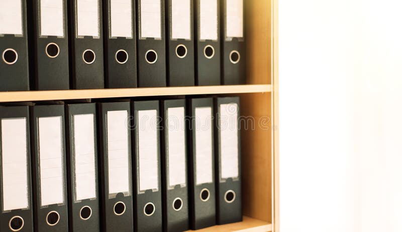 Black Office Folders Standing on Cabinet Shelves Stock Photo - Image of ...