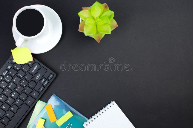 Black Office Table with Computer, Pen and a Cup of Coffee, Lot of ...