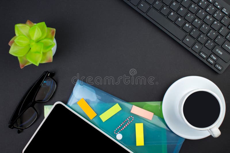 Black Office Table with Computer, Pen and a Cup of Coffee, Lot of ...