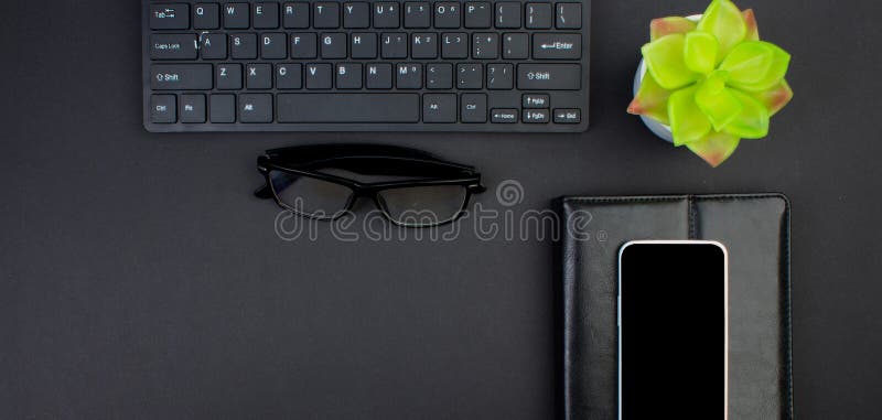 Black Office Table with Computer, Pen and a Cup of Coffee, Lot of ...