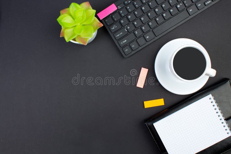 Black Office Table with Computer, Pen and a Cup of Coffee, Lot of ...