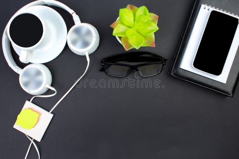 Black Office Table with Computer, Pen and a Cup of Coffee, Lot of ...