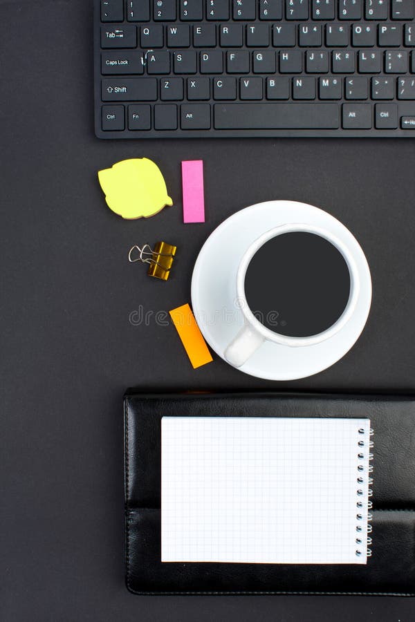 Black Office Table with Computer, Pen and a Cup of Coffee, Lot of ...