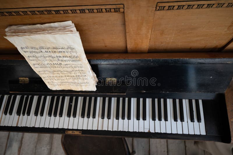 Black Old Piano in Cracks with Notes Stock Photo - Image of composition ...