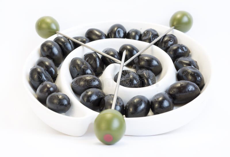 Black olives dish sticks stock photo. Image of appetizer - 48524478