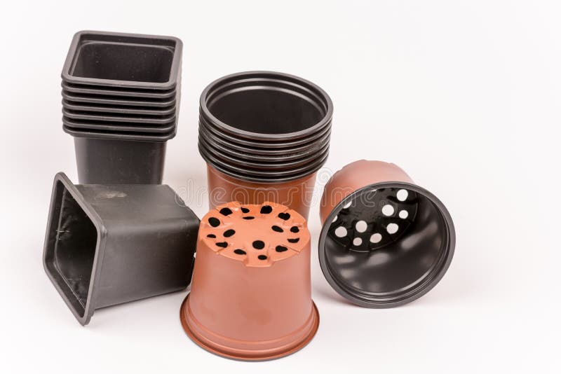 Black and Orange Square and Round Flower Pots Stock Image - Image of ...
