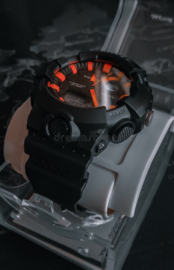 Black Orange Watch in box stock photo. Image of bumper - 247511156