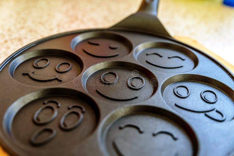 Black Pancake Smile Frying Pan on Worktop in Kitchen Stock Image ...