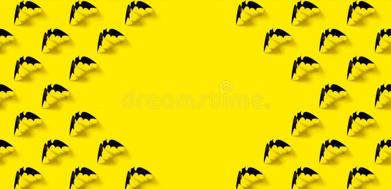 Black Paper Bat Pattern with Falling Shadow on Yellow Background ...