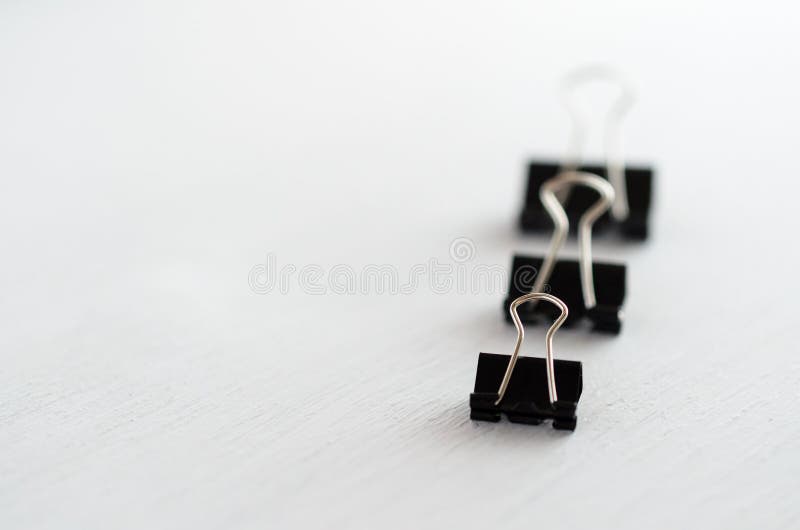 Black Paper Clamps of Office Supplies, Education Concept Stock Image ...
