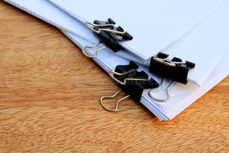 Black Paper Clipping on Three Set of Paper Stock Image - Image of ...