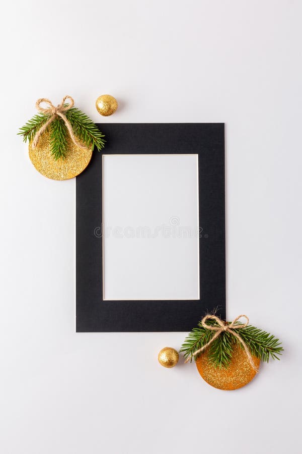 Black Paper Frame with Golden Christmas Baubles Stock Photo - Image of ...