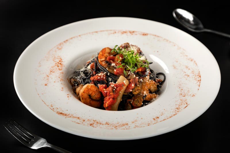 Black Pasta with Seafood in a Deep Plate Stock Image - Image of ...