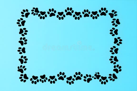 Black Paw Prints Forming a Rectangular Frame on a Bright Blue Backdrop ...