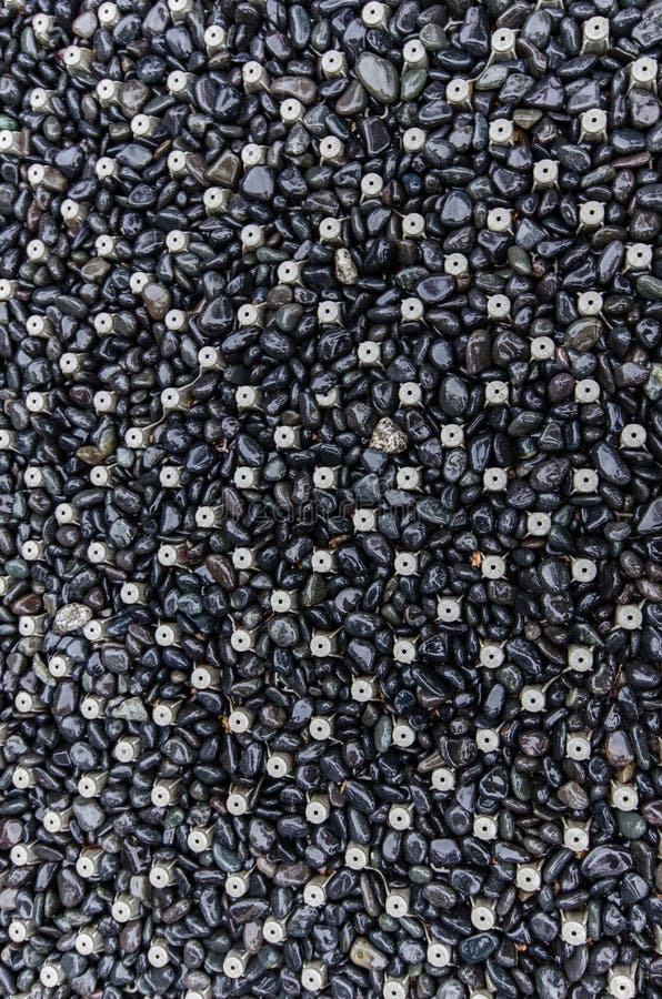Black Pebble Floor Set in Cement Stock Photo - Image of cobble, pattern ...